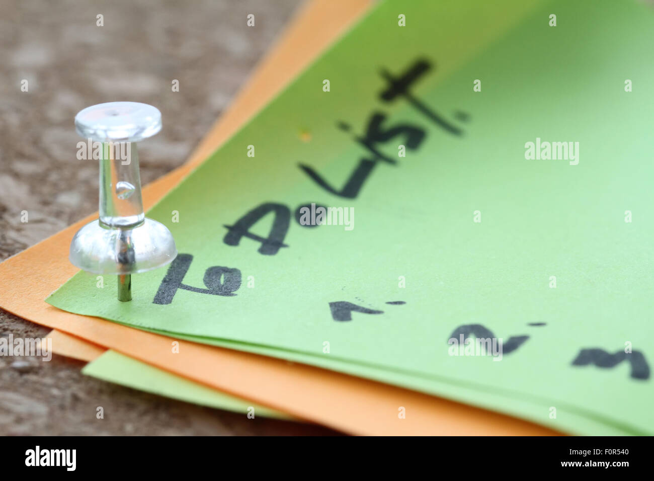 close up of pin and hand drawn business strategy graph chart on sticky ...