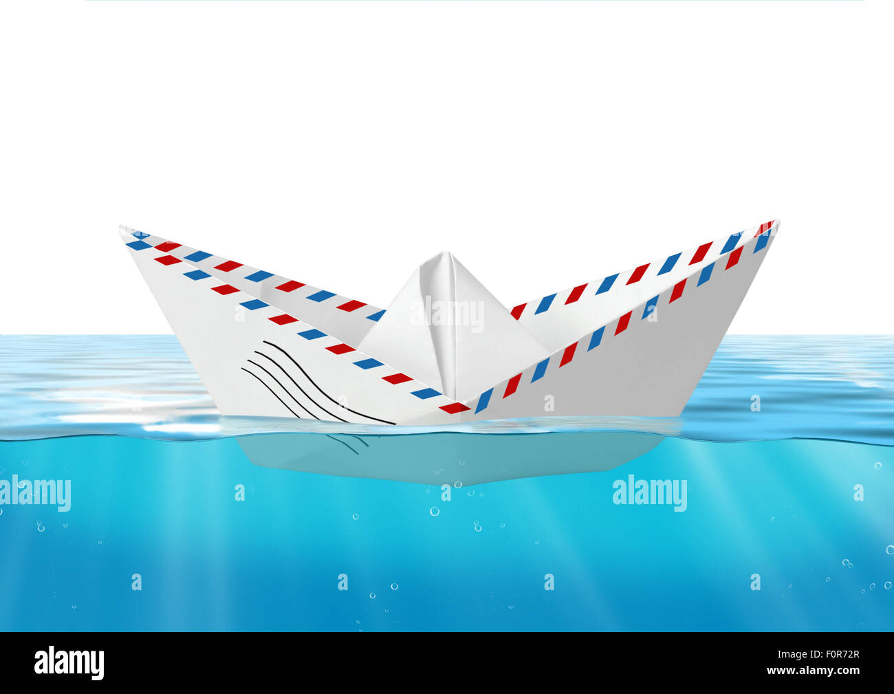 Paper boat made from mail envelope floating at water, post concept ...