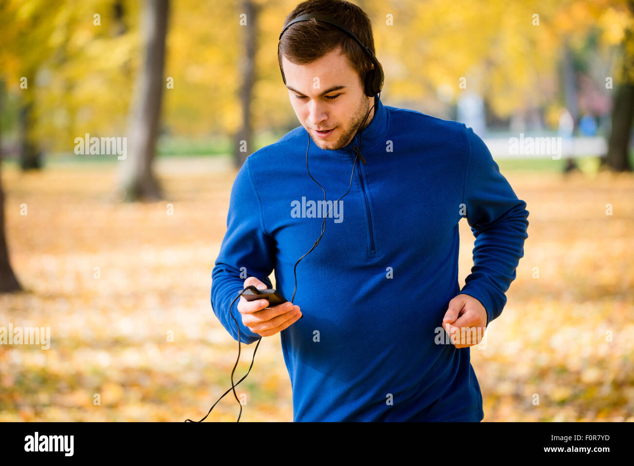 Man running smiling outside hi-res stock photography and images - Alamy