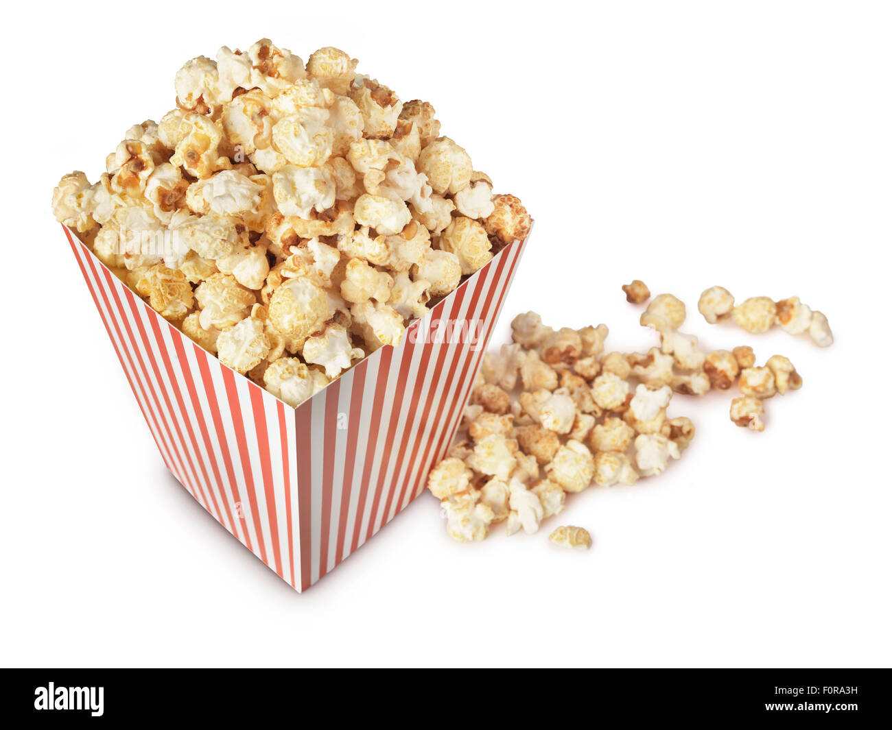 A movie theater popcorn box heaped with the fresh popped, crispy, salty ...