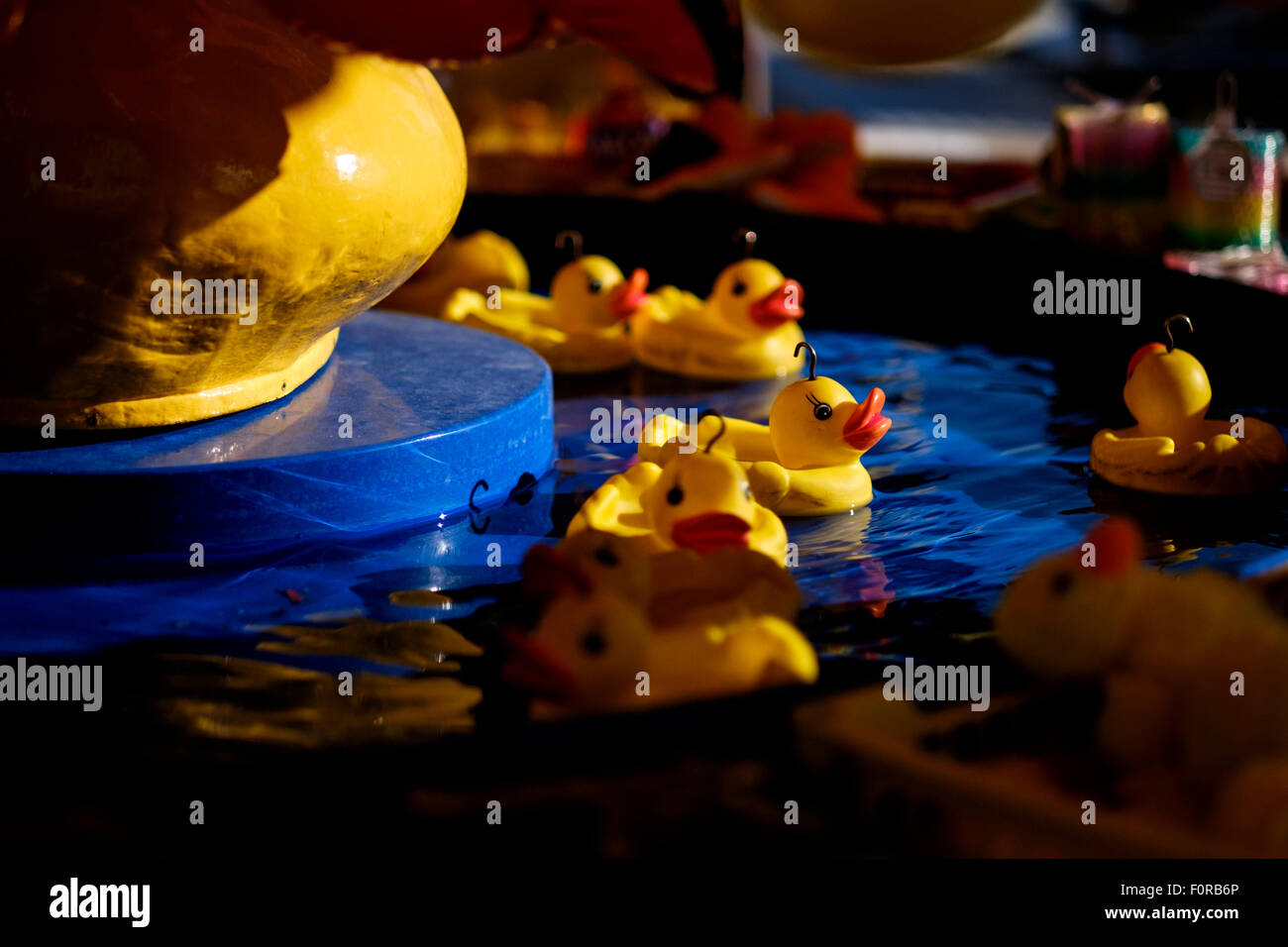 Hook a Duck fairground stall Stock Photo - Alamy