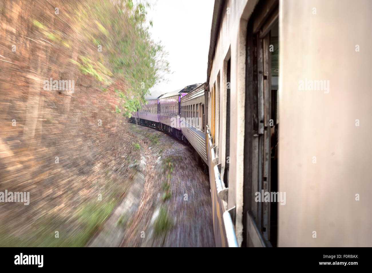 Train on the move in Thailand, with motion blur Stock Photo - Alamy