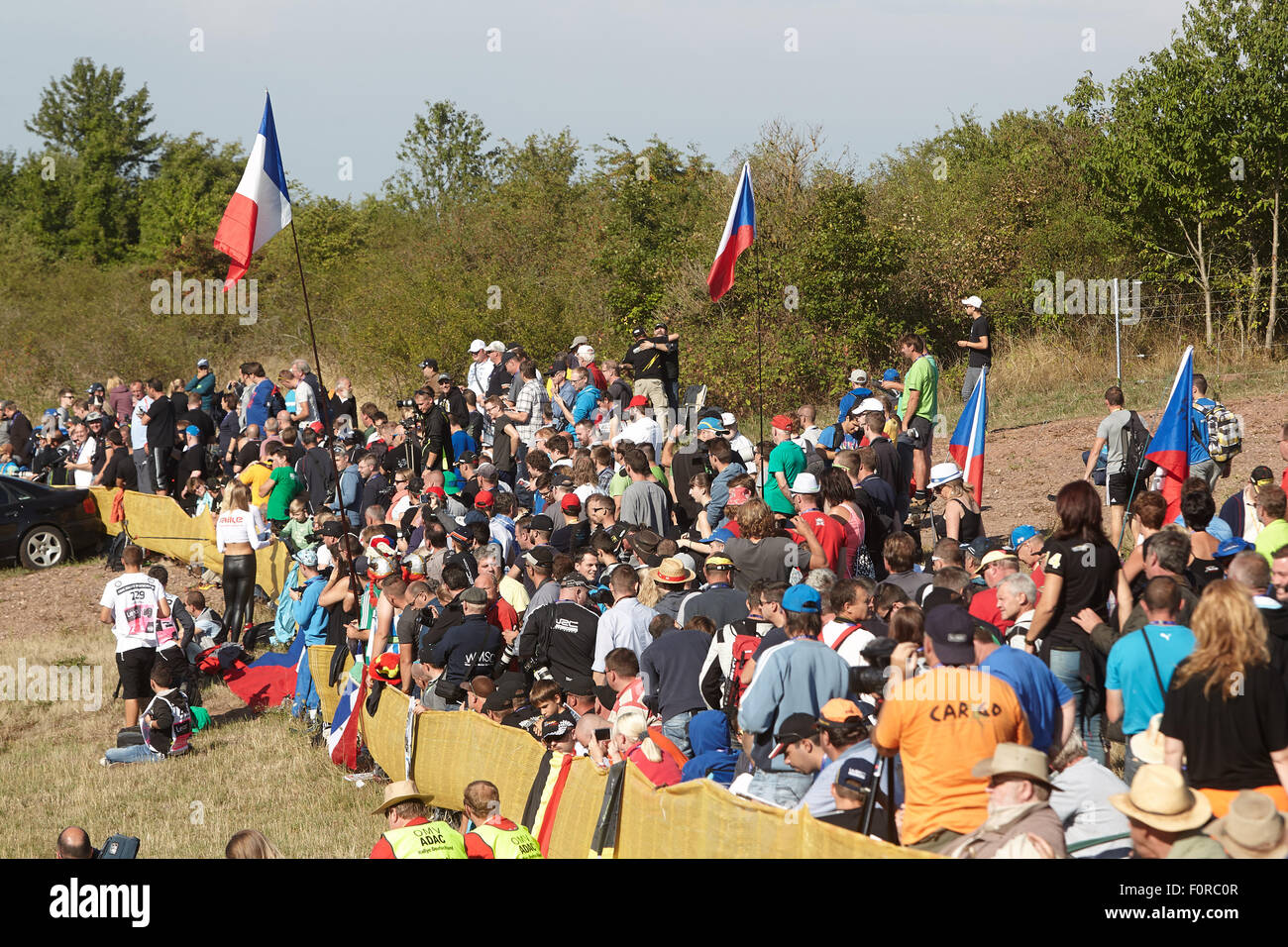 Konz, Germany. 20th Aug, 2015. Spectators stand at the shakedown near ...