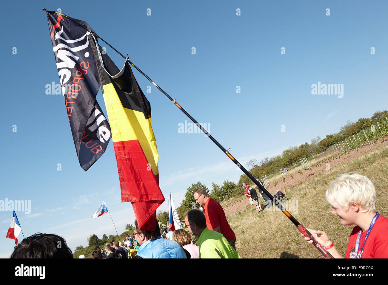Konz, Germany. 20th Aug, 2015. Spectators stand at the shakedown near ...