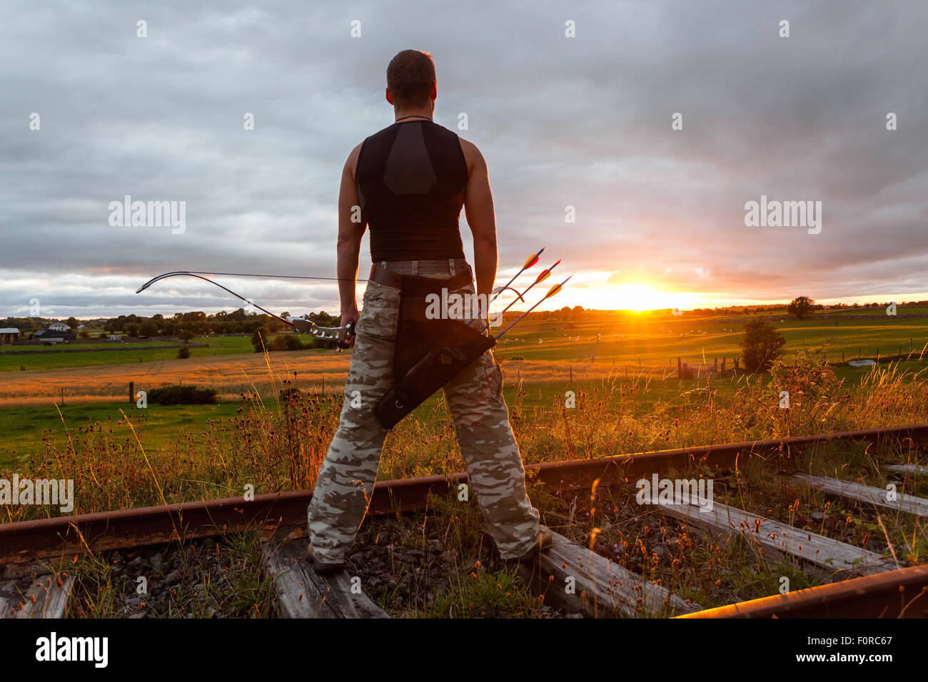 Man aiming bow arrow man hi-res stock photography and images - Alamy