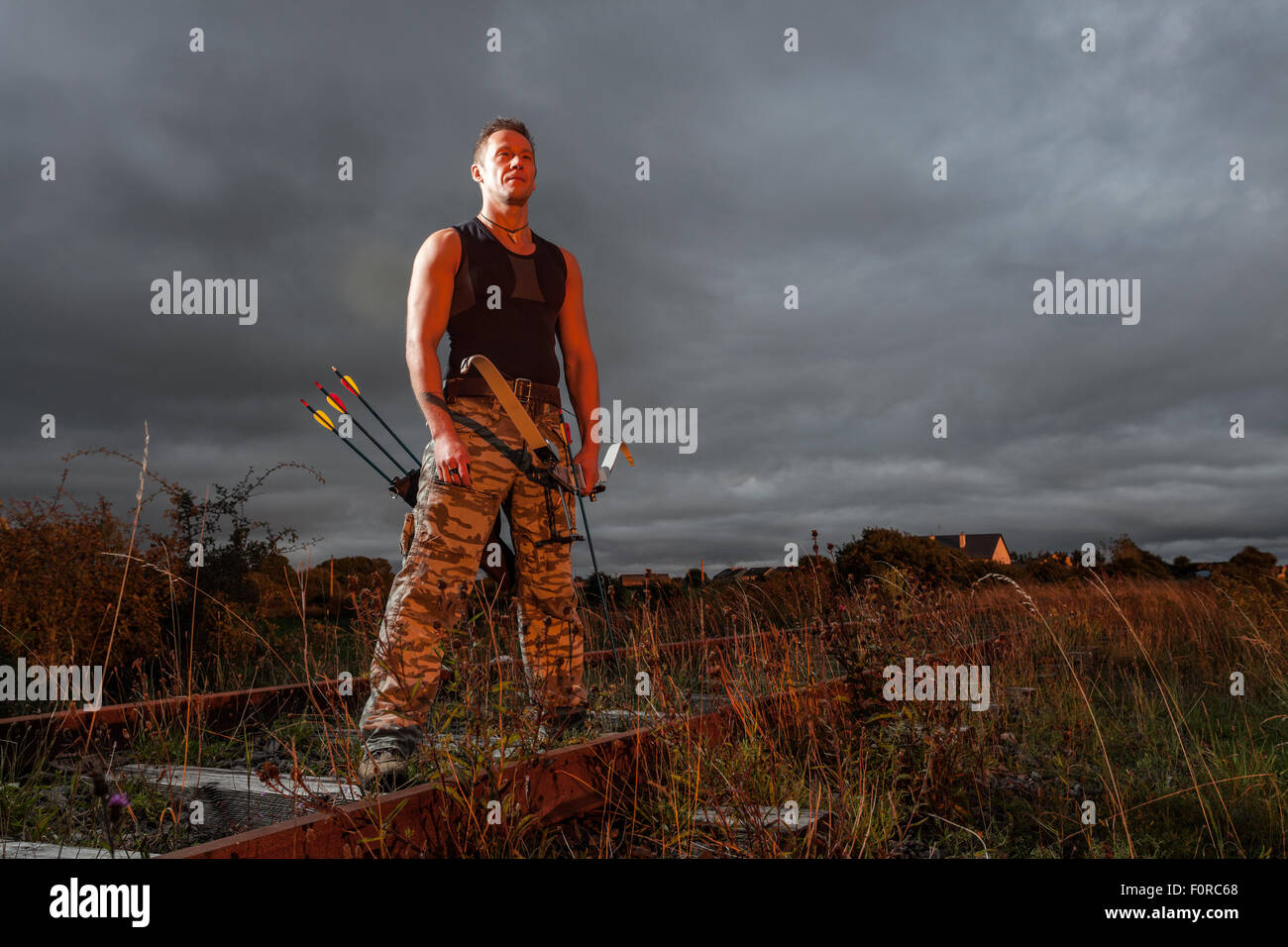 Man aiming bow arrow man hi-res stock photography and images - Alamy