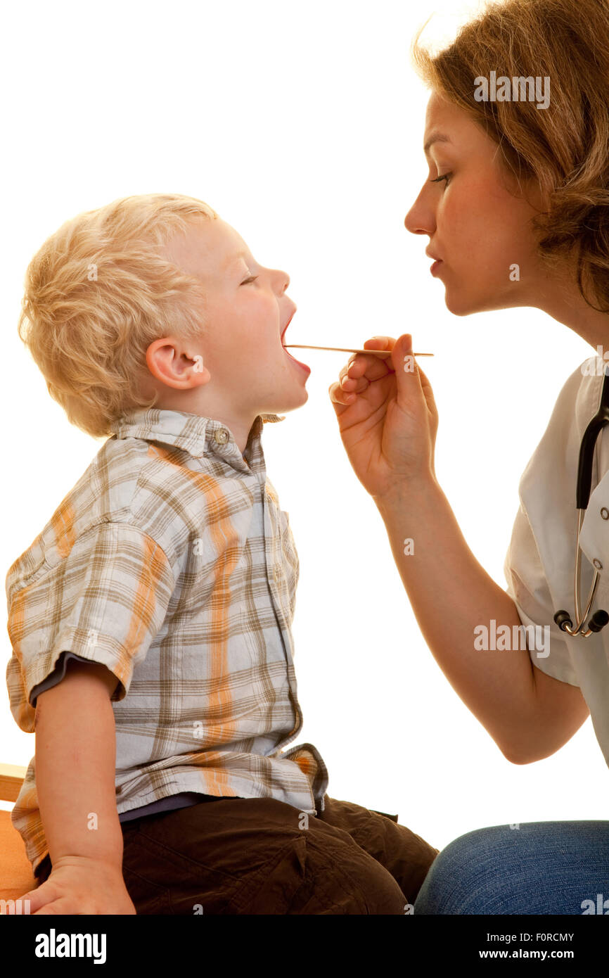 Pediatrist screening a young boy Stock Photo - Alamy