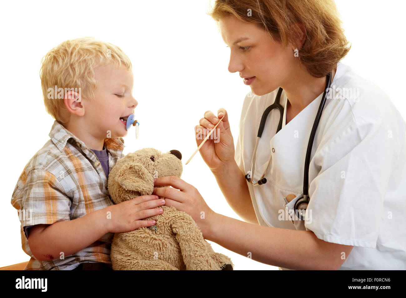 Boy checks his stuffed animal at the pediatrist Stock Photo - Alamy