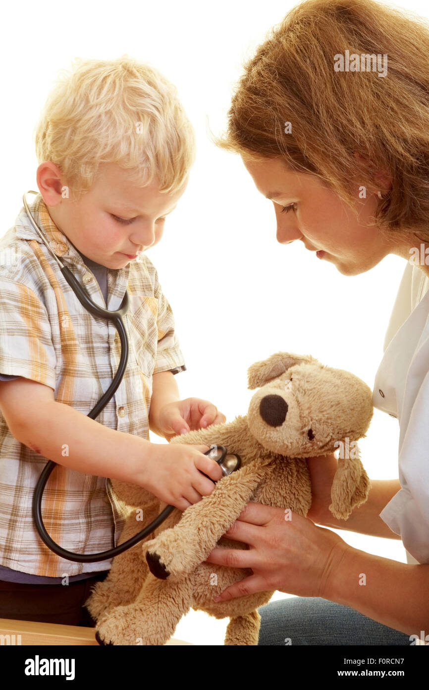 Boy plays at the pediatrist with a stethoscope Stock Photo - Alamy