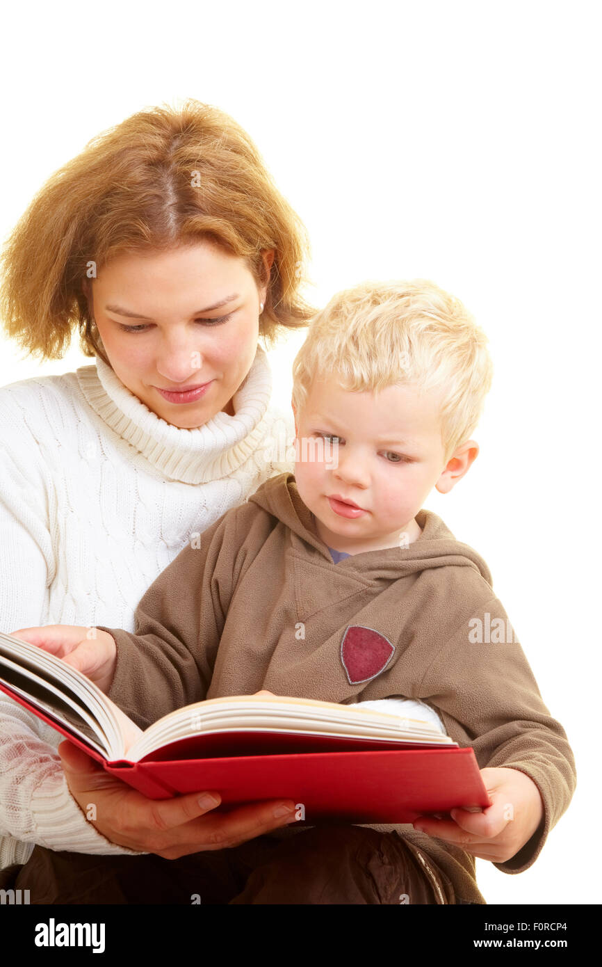 Mother reading a book with her son Stock Photo - Alamy