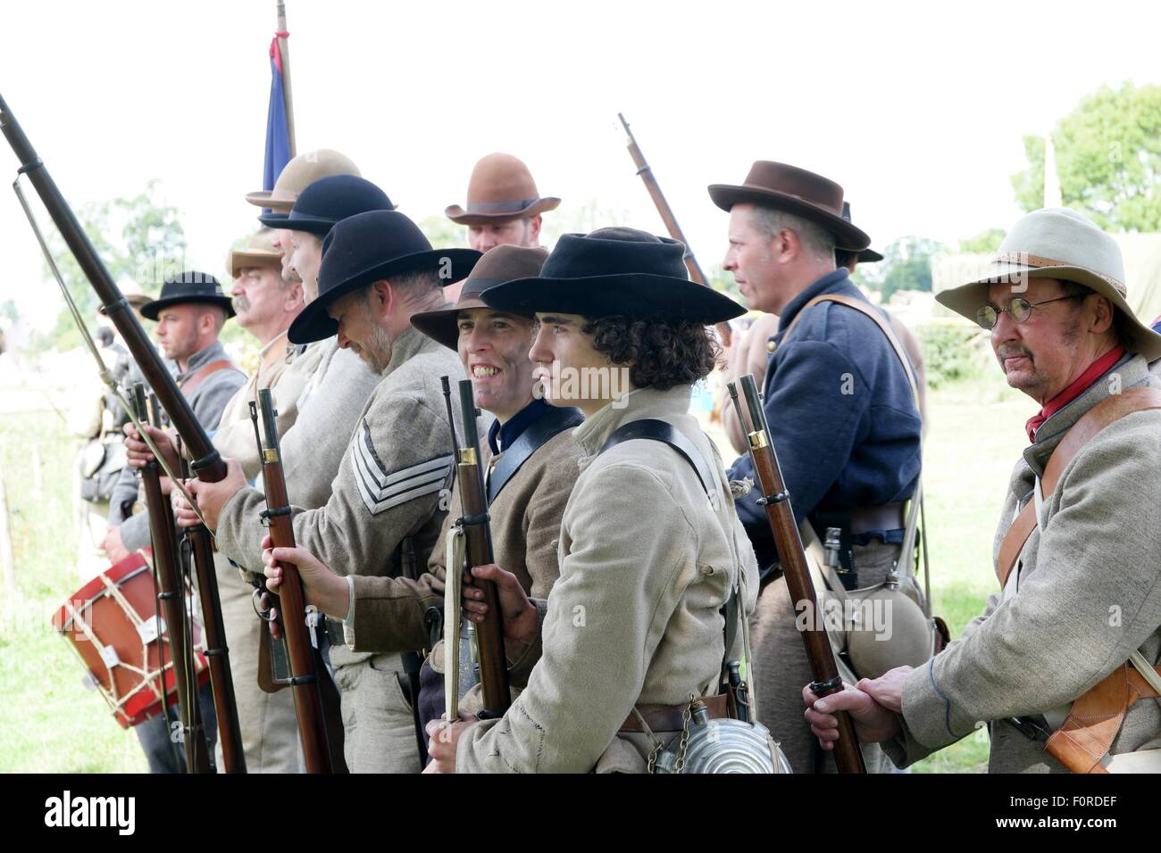 Historical re-creation with characters in period costume to recreate ...