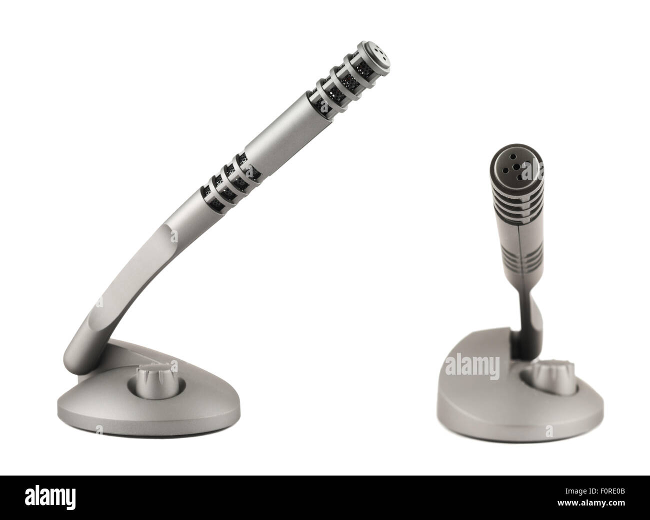 Wireless grey plastic microphone transmitter isolated over white ...