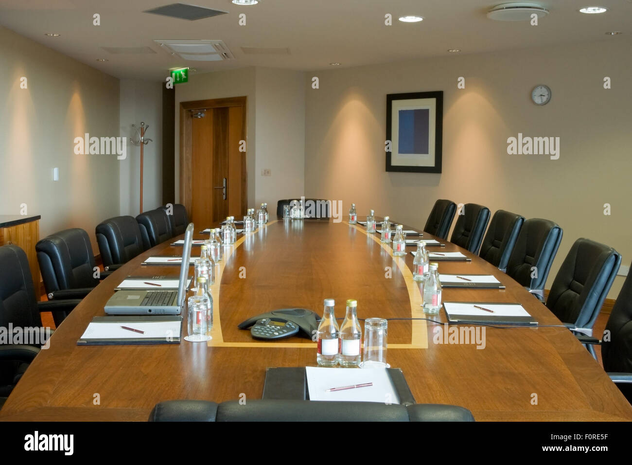 conference hall Interior with table, raw of chairs and block-notes ...