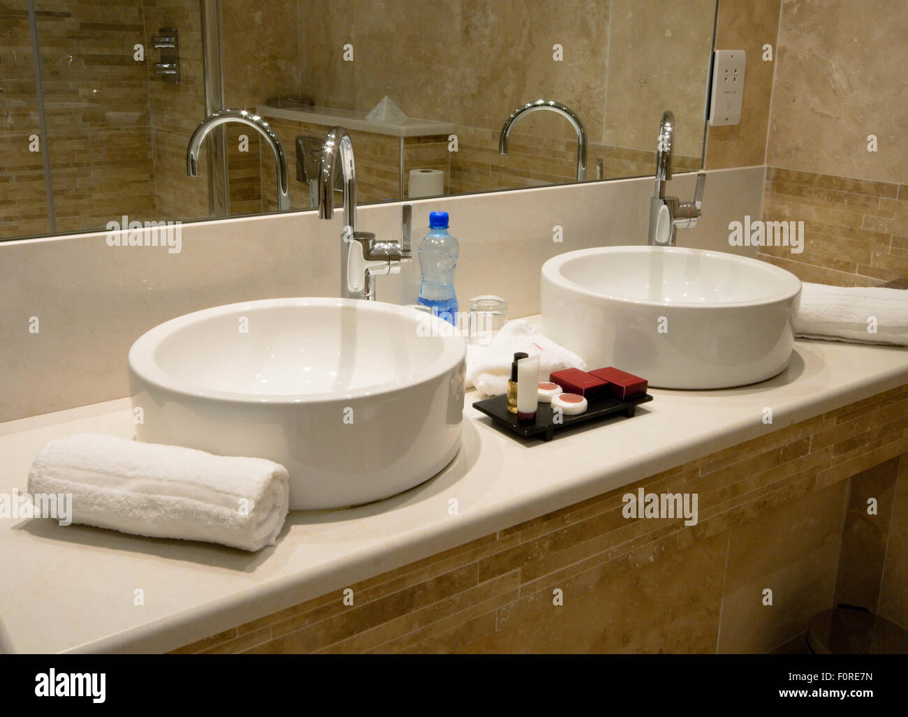 Modern Bathroom interior, marble sink and tap Stock Photo - Alamy