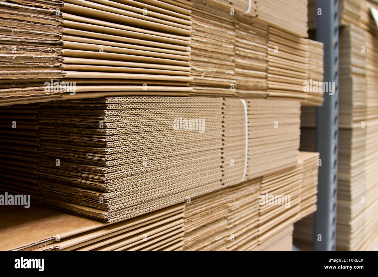 heap of cardboard packages in warehouse. Abstract. Detail Stock Photo ...
