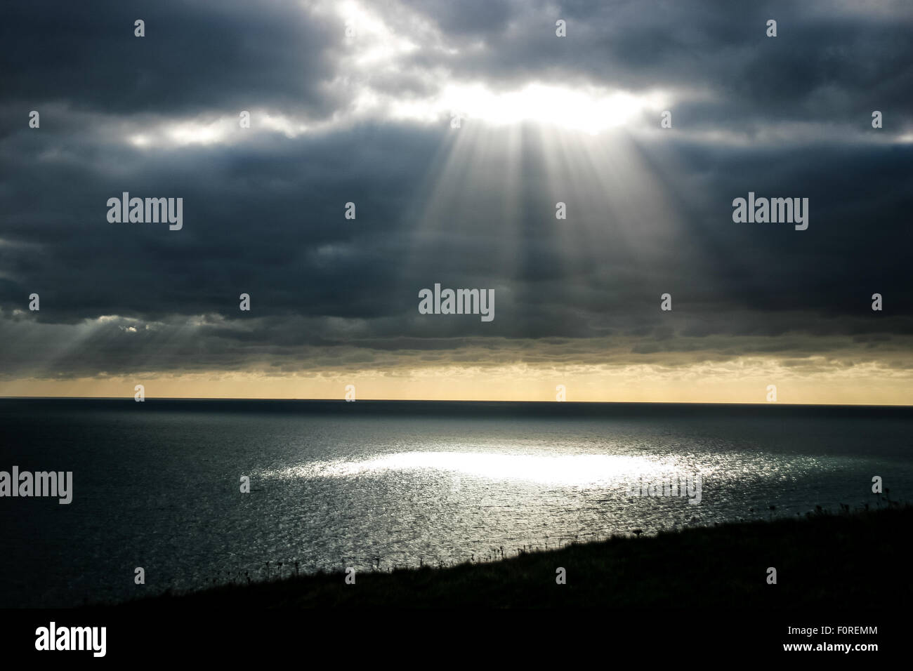 Rays Of Sunlight Through Storm Clouds