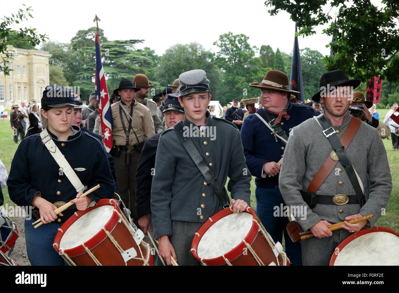 Historical re-creation with characters in period costume to recreate ...