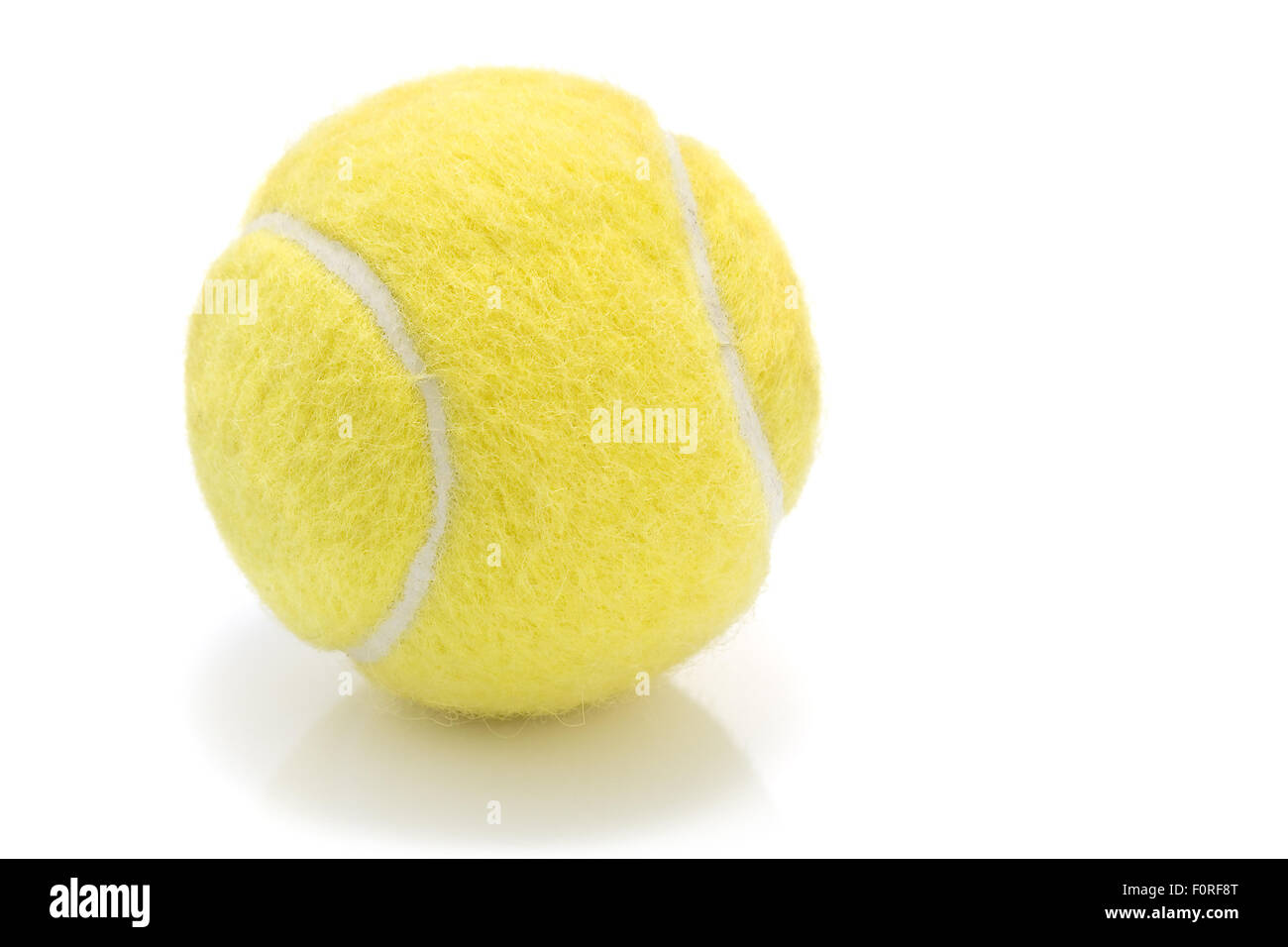 Tennis ball on white with background Stock Photo - Alamy