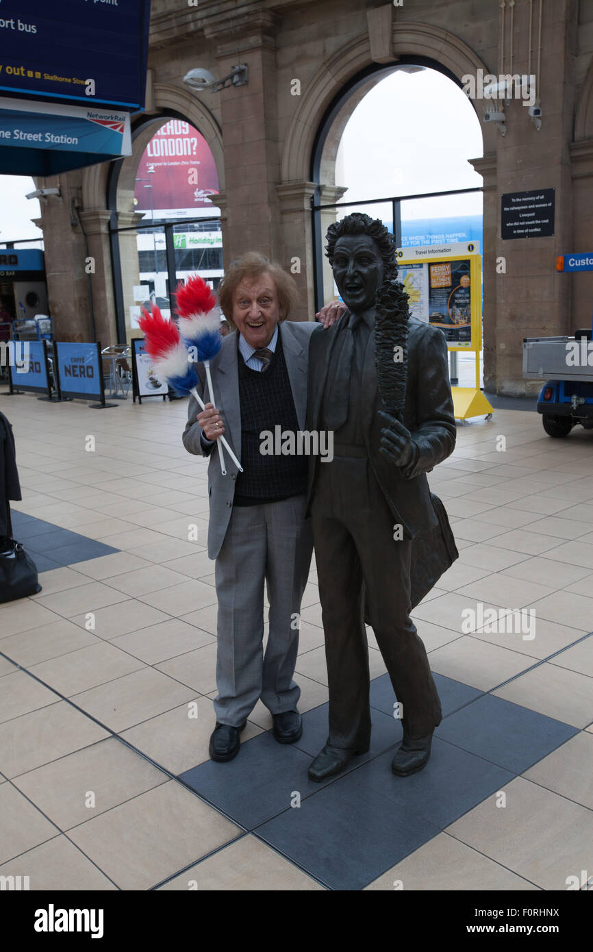 Ken Dodd, Liverpool's "Squire of Knotty Ash", stands next to his statue ...