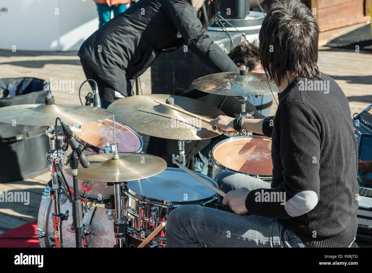 Black hair drummer during outdoor concert hi-res stock photography and ...
