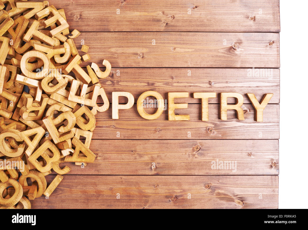 Word poetry made with wooden letters Stock Photo - Alamy