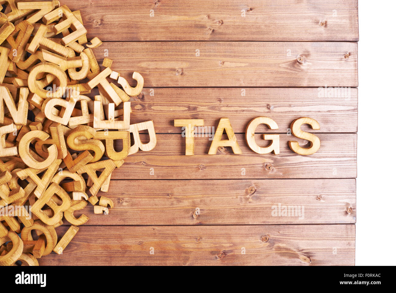 Word tags made with wooden letters Stock Photo - Alamy