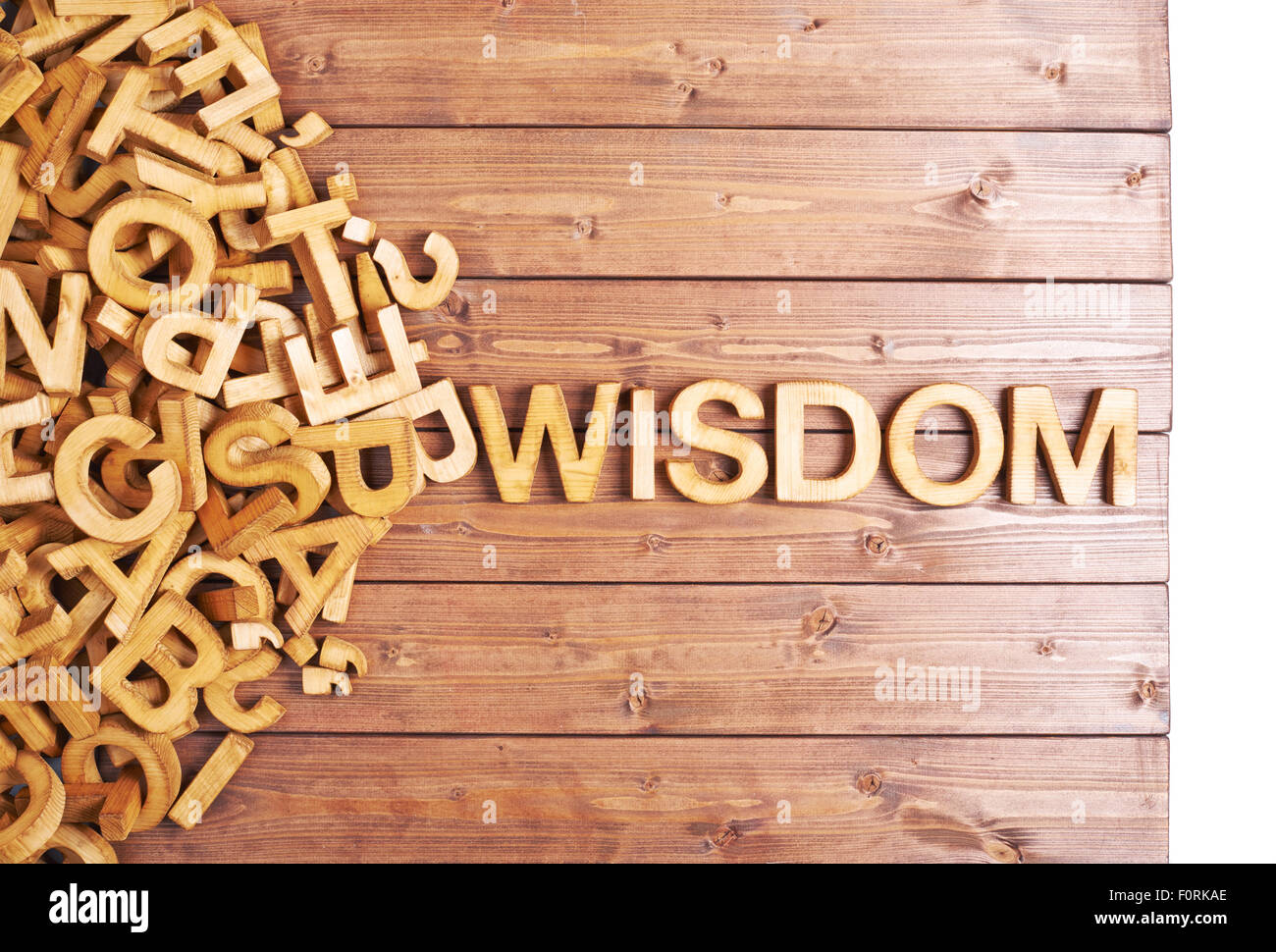 Word wisdom made with wooden letters Stock Photo - Alamy
