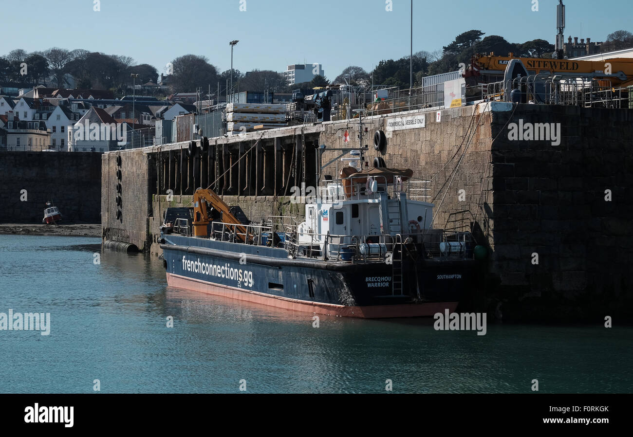 Brecqhou warrior ship moored at ST Peter port Guernsey a small freight ...