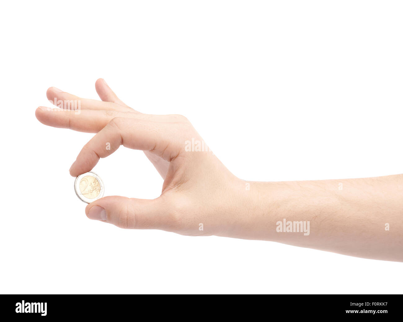 Hand holding two euro coin Stock Photo - Alamy