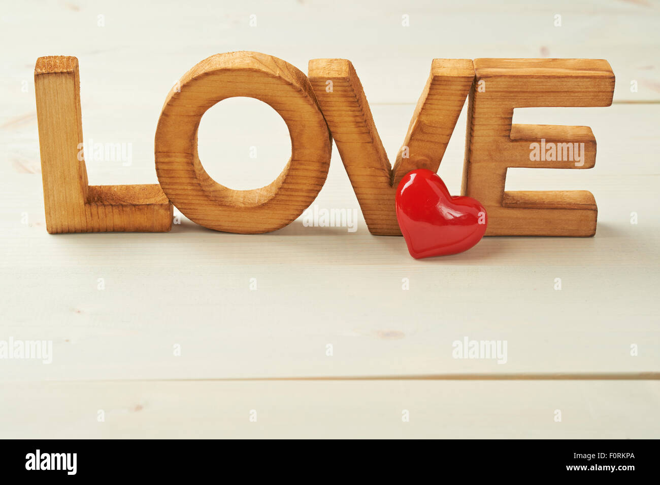 Wooden word love heart hi-res stock photography and images - Alamy