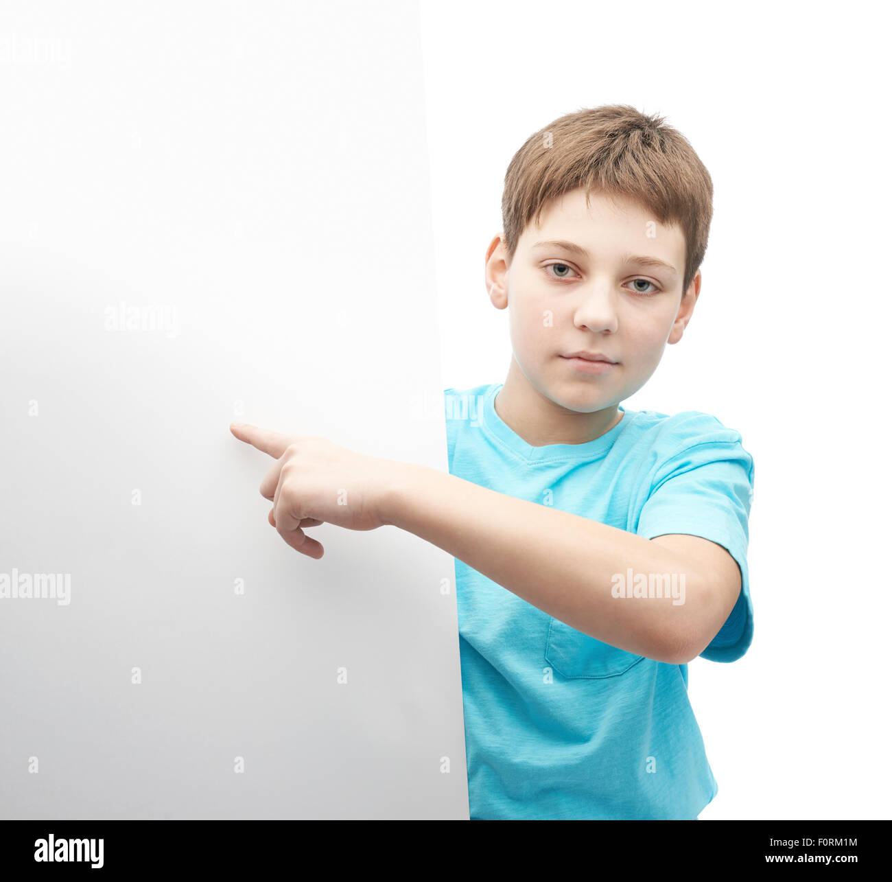 Young boy with a sheet of paper Stock Photo - Alamy