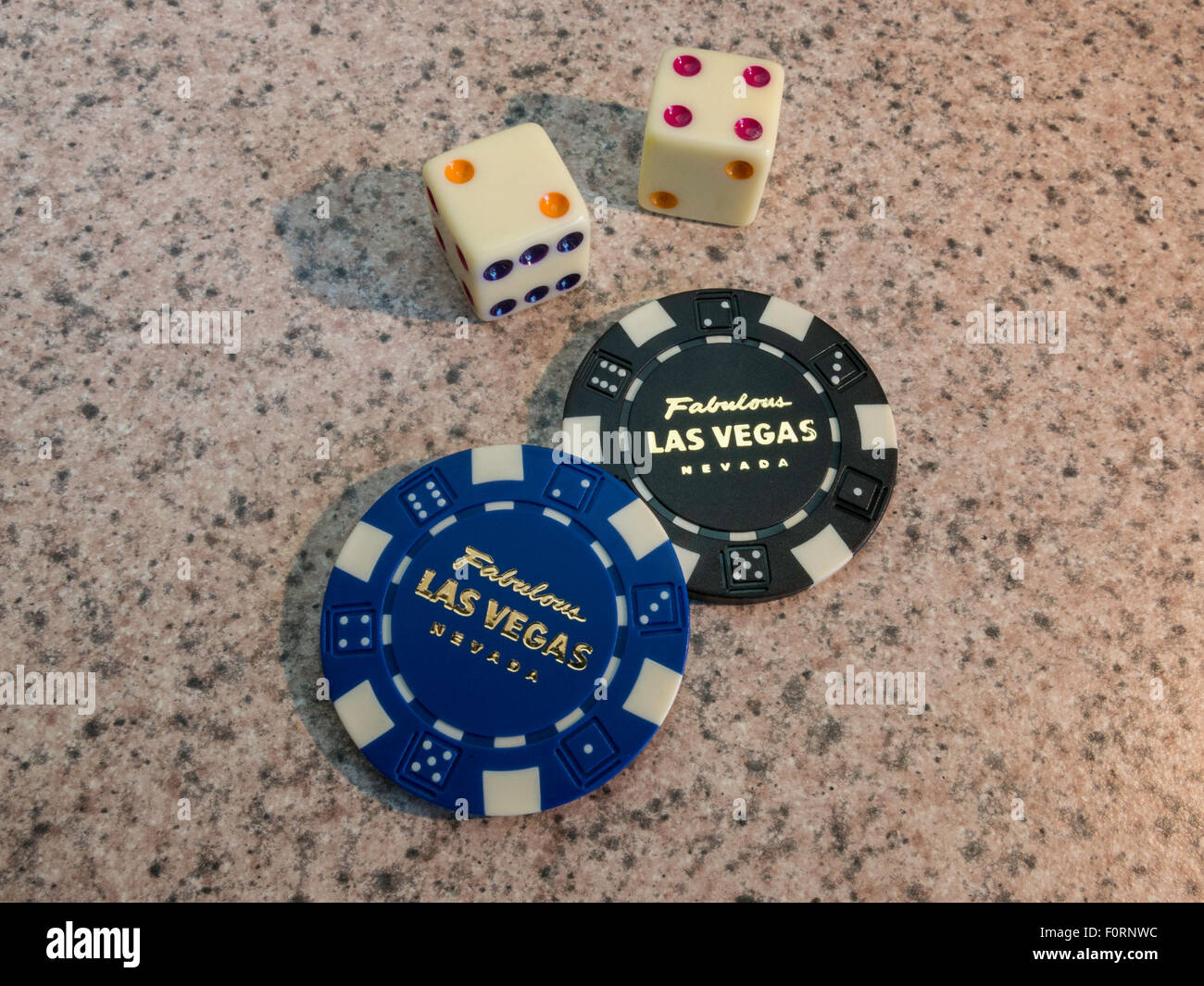 Dice and Betting Poker Chips Stock Photo - Alamy