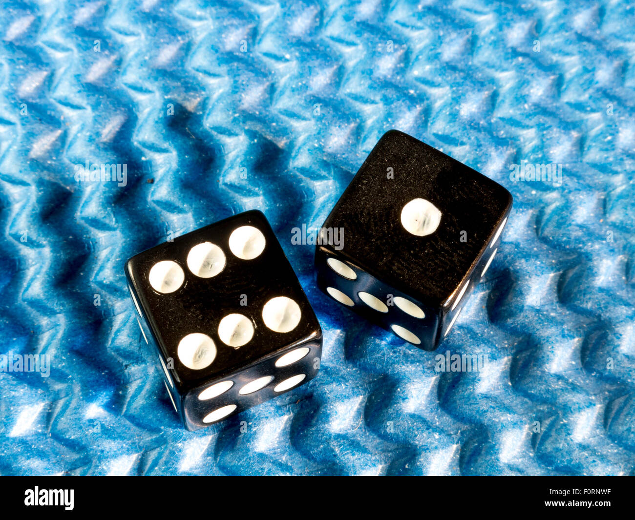 Lucky Seven Rolled Dice on Blue Textured Background Stock Photo - Alamy
