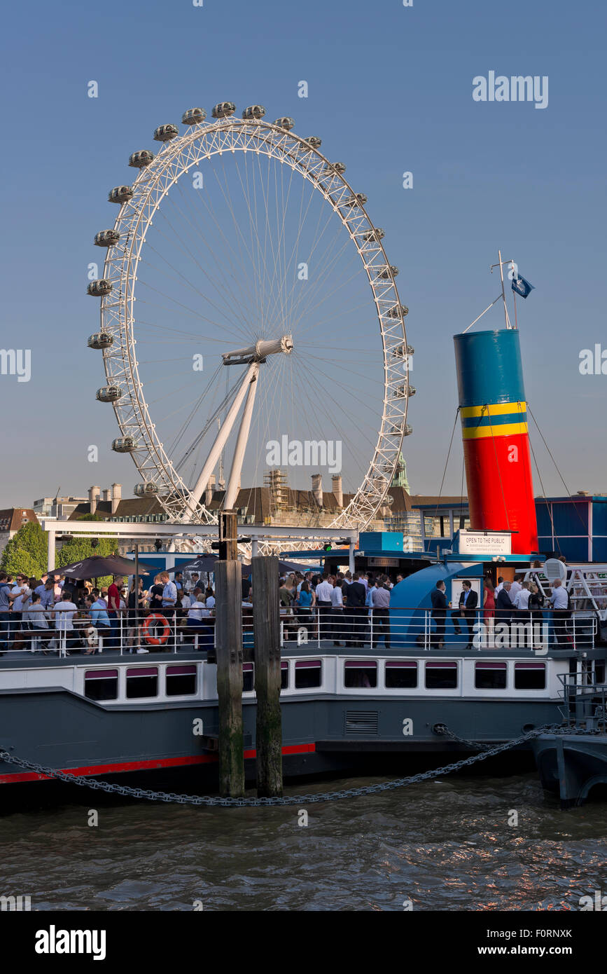People aboard the Tattershall Castle, a floating bar on the River ...