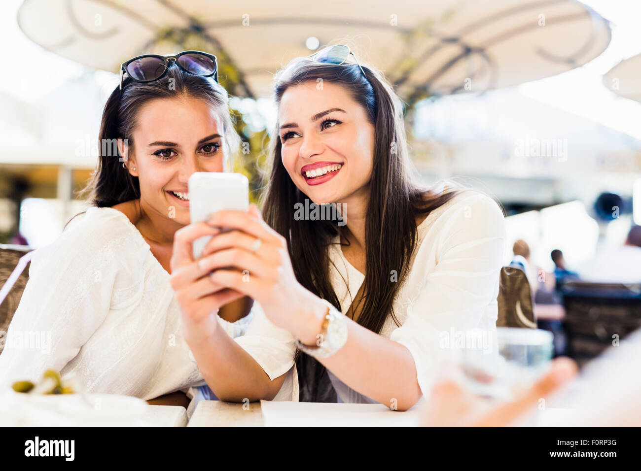 Girls laughing during lunch break hi-res stock photography and images ...