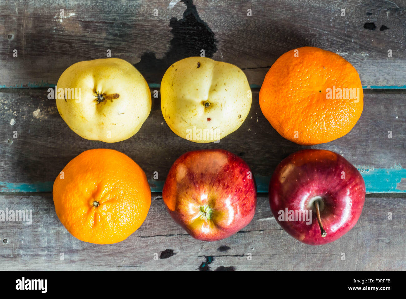 Many fruits put together on a wooden board Stock Photo - Alamy