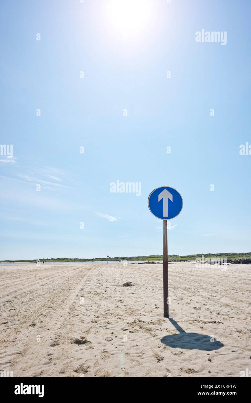 Signs showing the beach route to Omey Island Stock Photo - Alamy