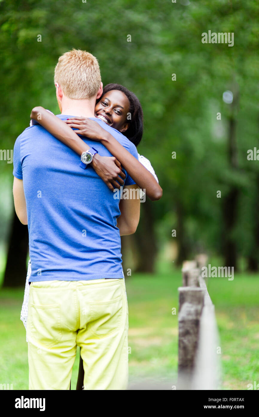 Couple in love hugging peacfully outdoors and being truly happy ...