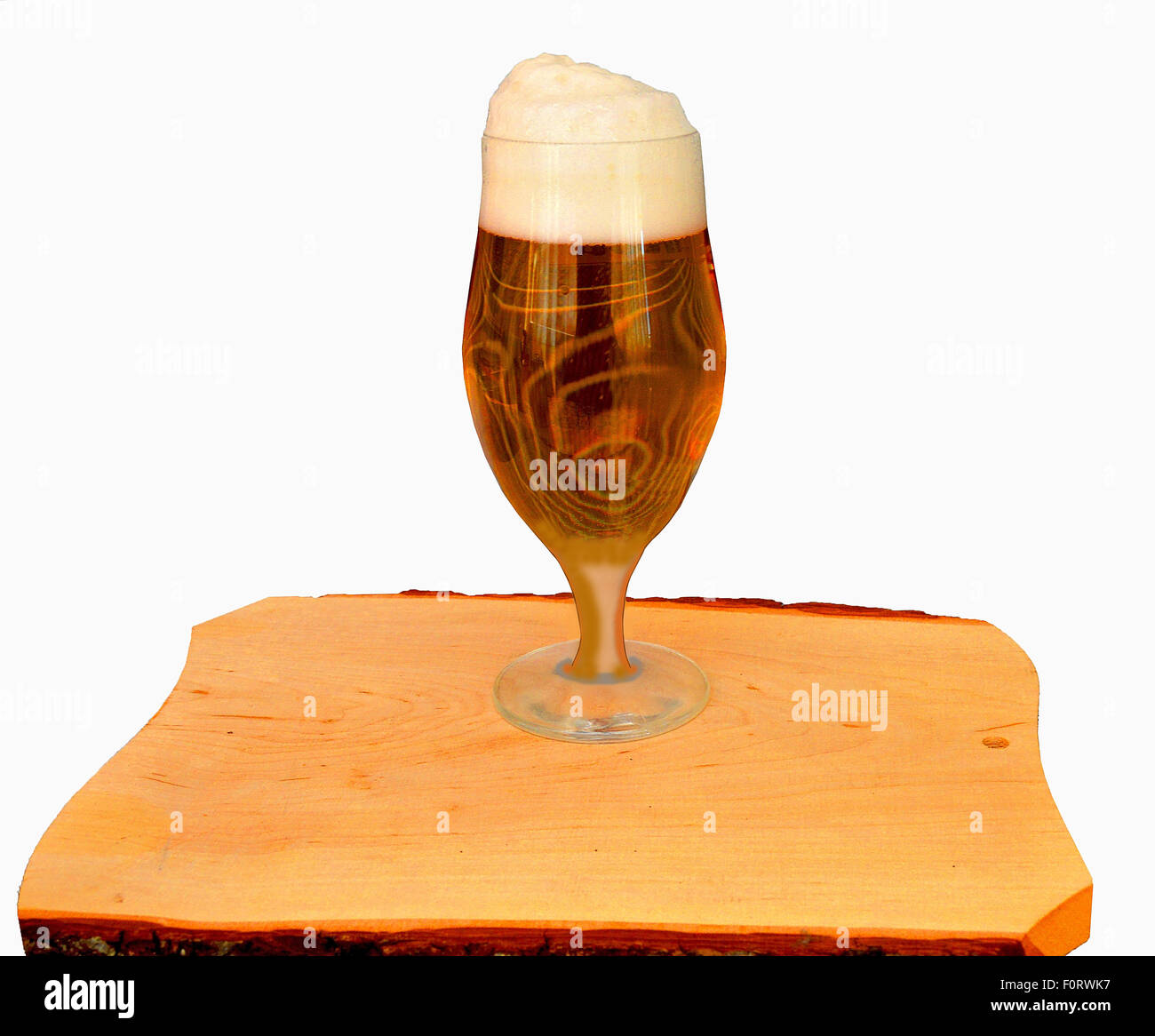 Beer by the glass on a wooden table Stock Photo - Alamy
