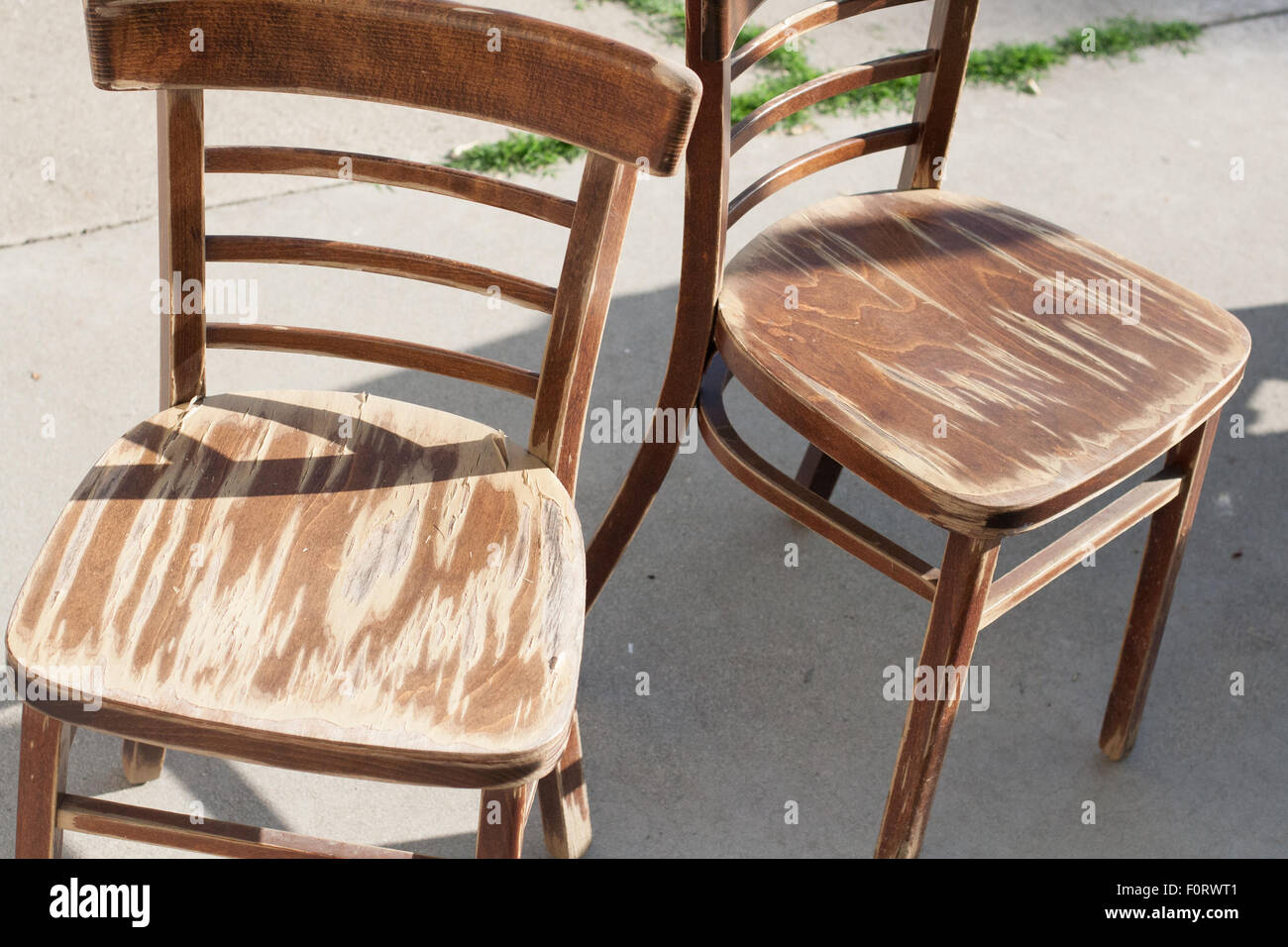 Two worn wooden chairs Stock Photo - Alamy