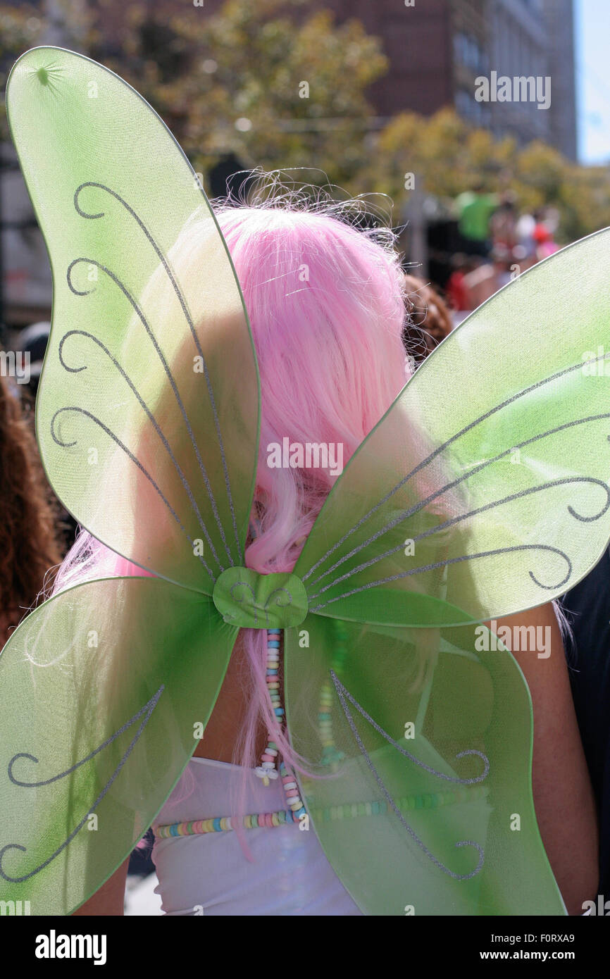 Fairy green butterfly wings pink hair Stock Photo - Alamy