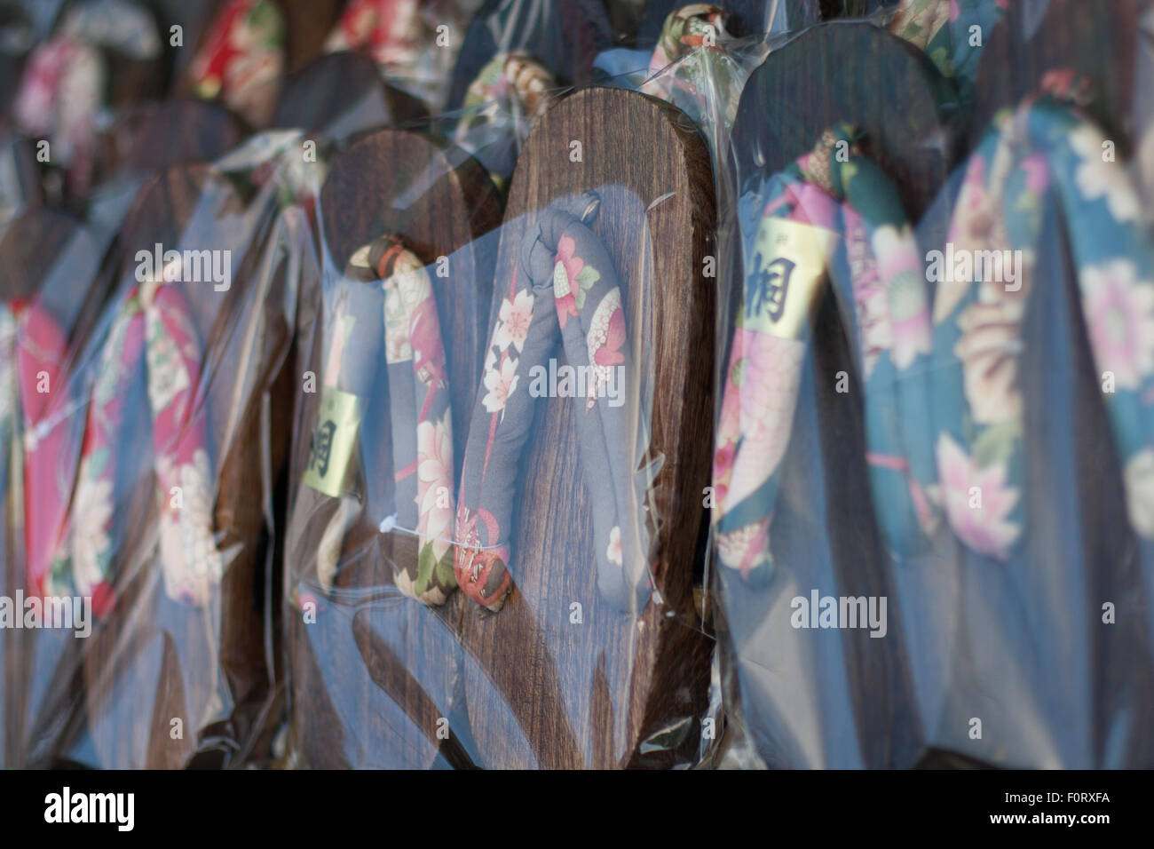 Japanese traditional wooden slippers in plastic wrapper Stock Photo - Alamy
