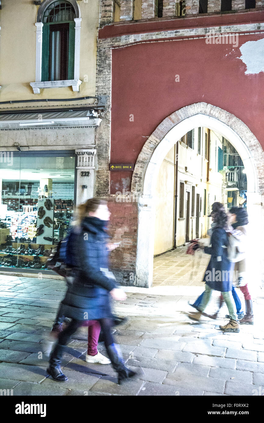 Busy Tourists explore Venice at night Stock Photo - Alamy