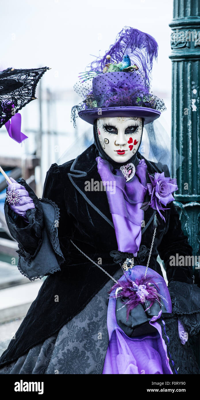 A Carnival Model posing for photographs at the waterfront of St. Mark's ...