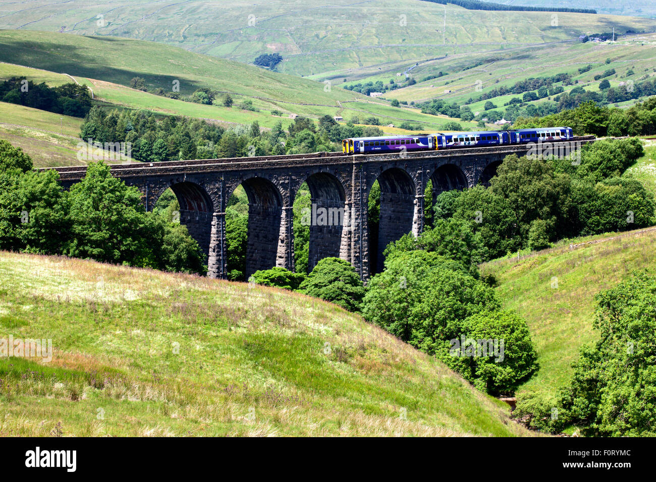 Northern rail train crossing railway viaduct hi-res stock photography ...