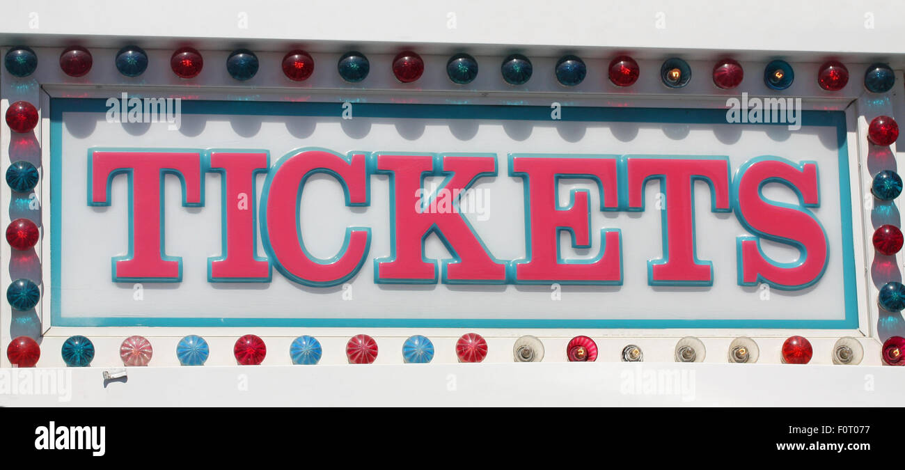 Tickets sign at the amusement park Stock Photo - Alamy