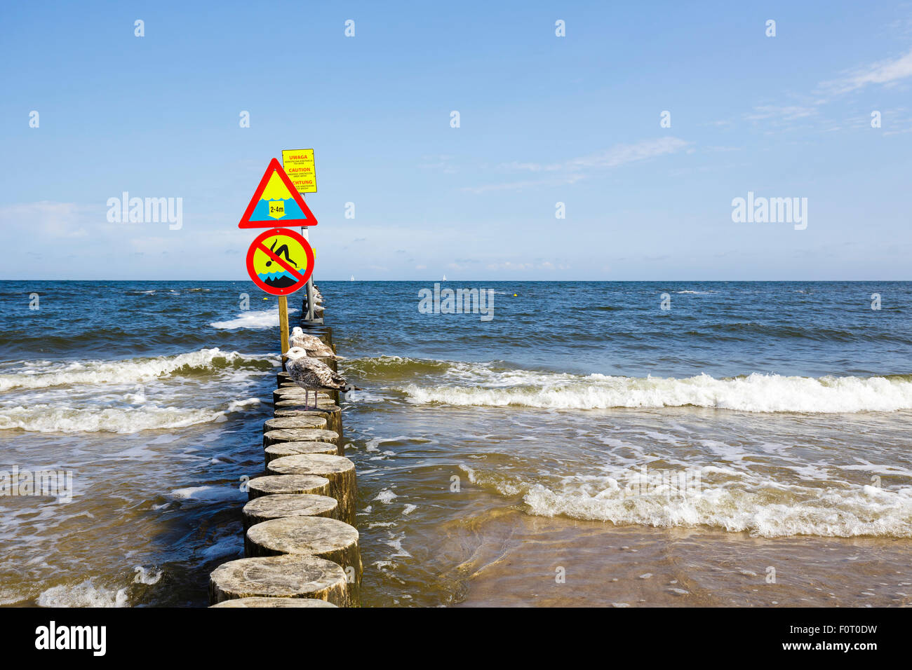 No jumping and large depth warning sign Stock Photo - Alamy
