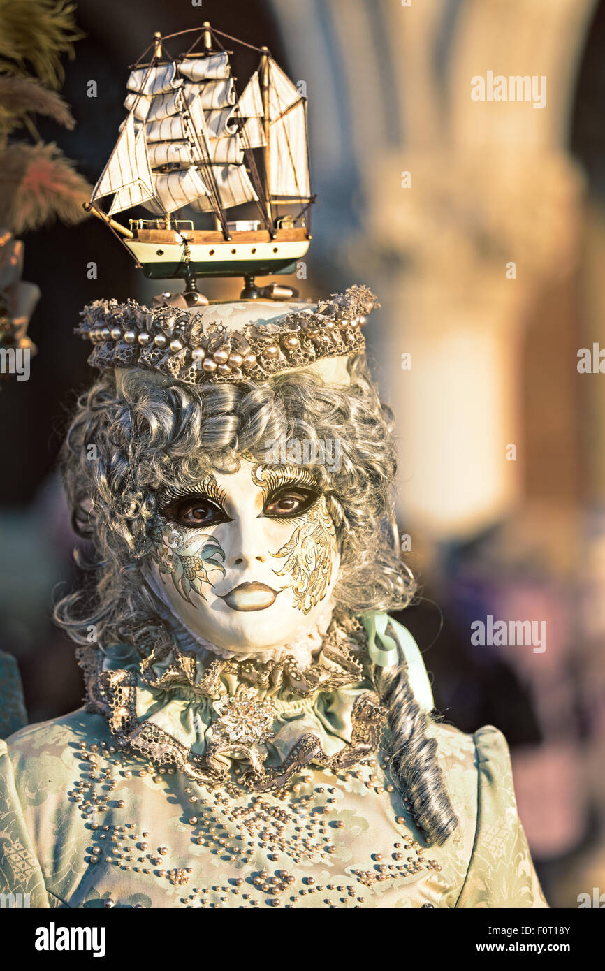 A Venice carnival Model with A ship Hat Stock Photo - Alamy