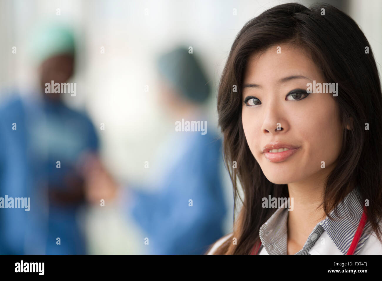 Chinese female doctor, surgeons on backgrounds Stock Photo - Alamy