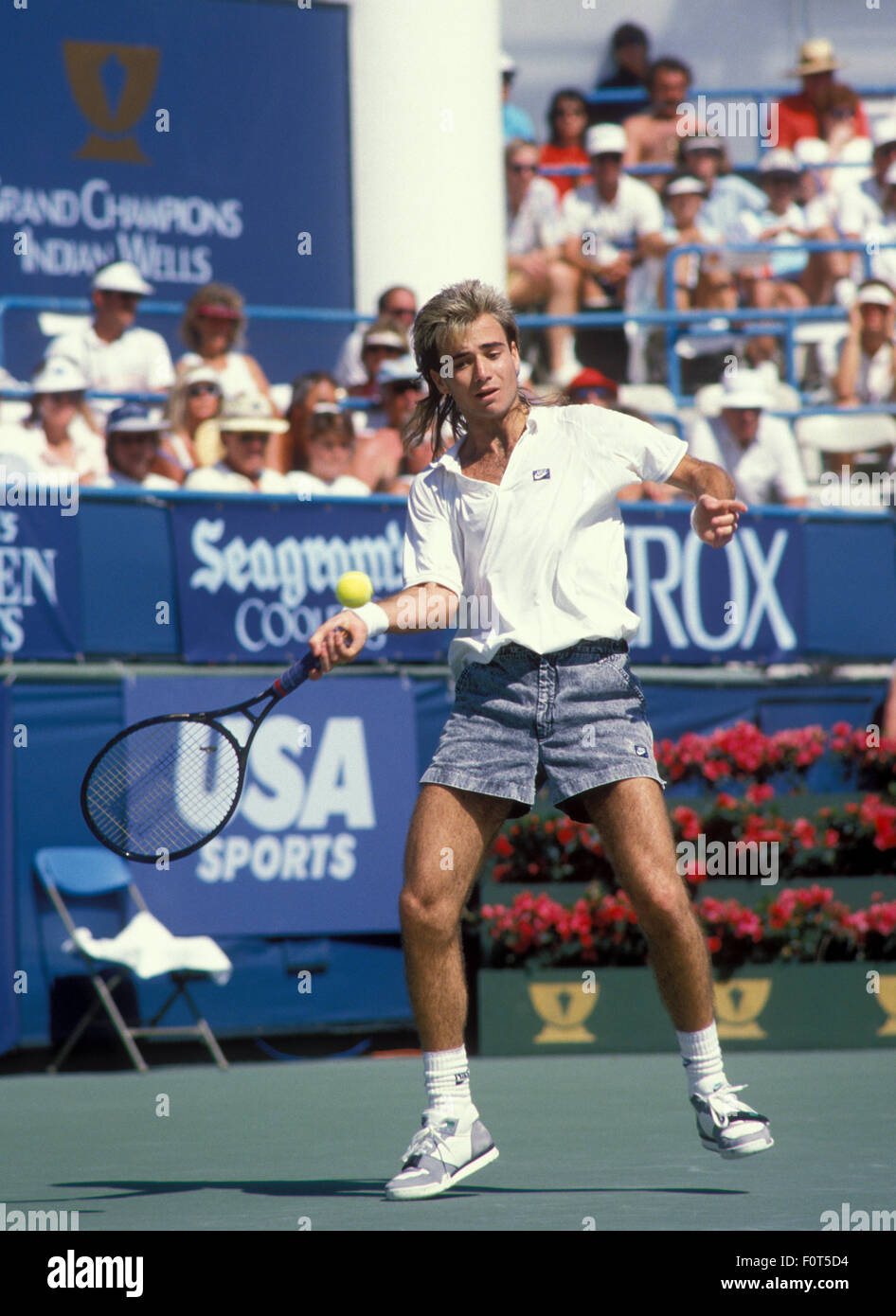 Andre Agassi in action against Boris Becker at the Newsweek Champions ...